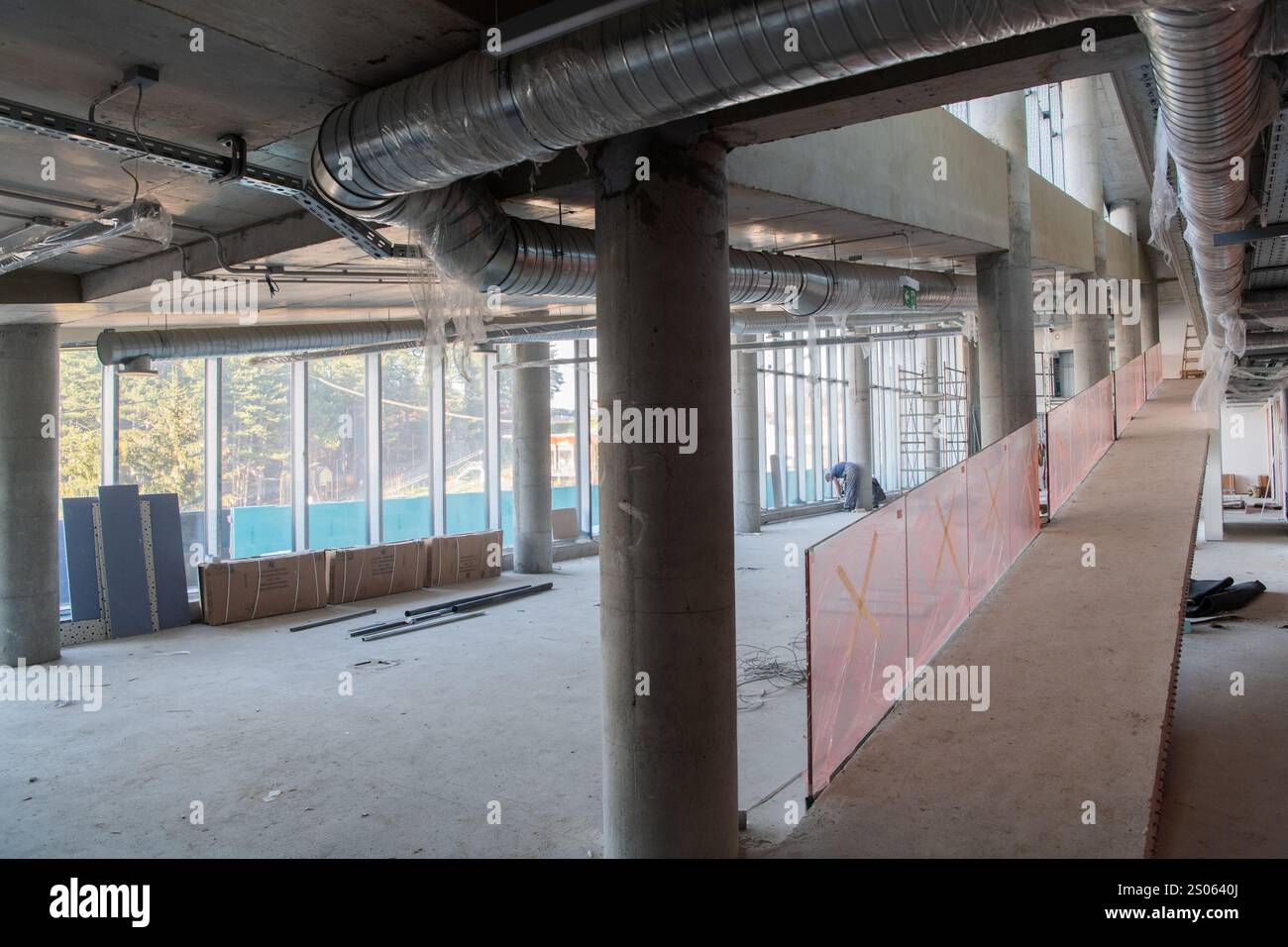 A captivating view of a modern business building under construction ...