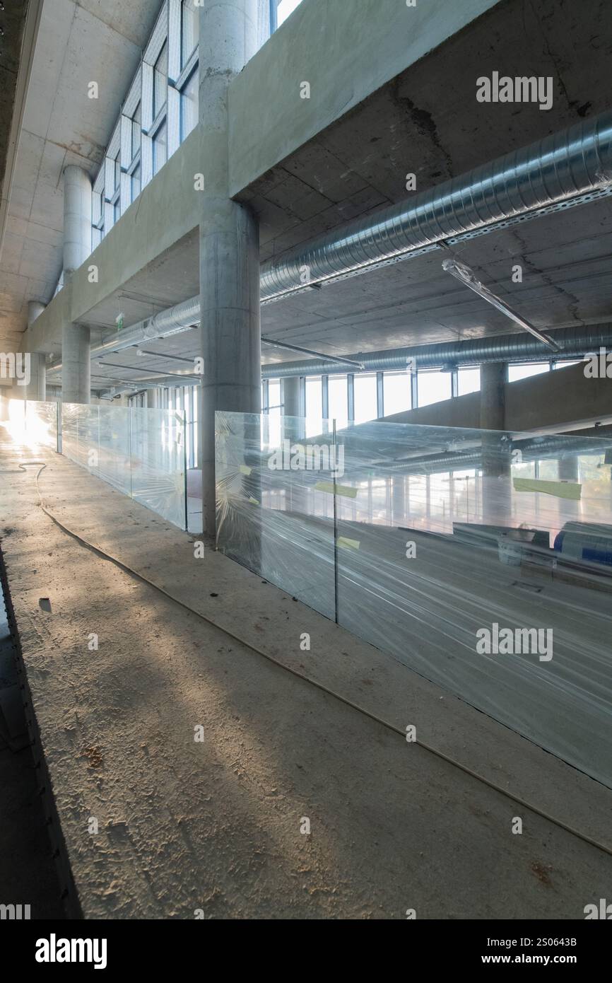 A captivating view of a modern business building under construction ...