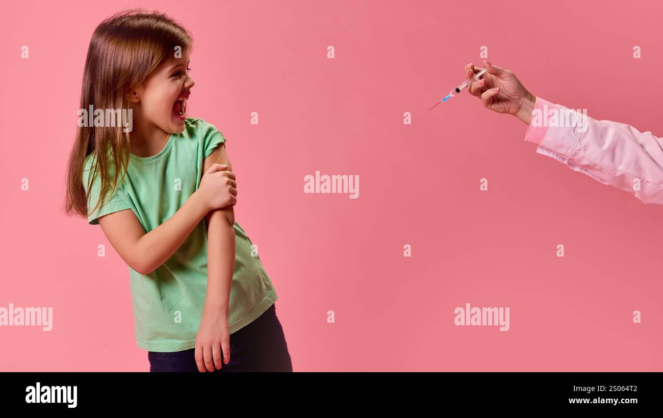 Girl in green shirt reacting dramatically holding hand on arm near ...