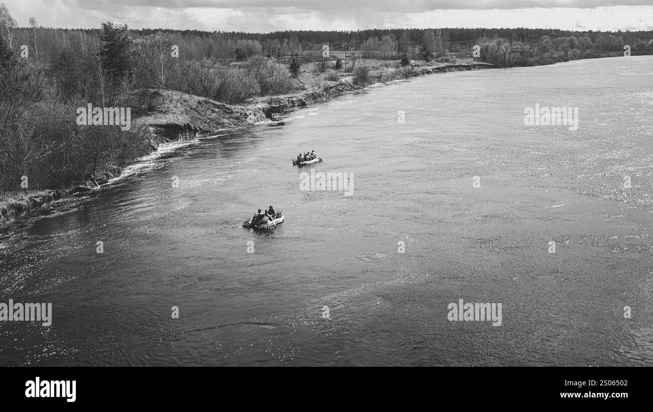 People boats out on Black and White Stock Photos & Images - Alamy