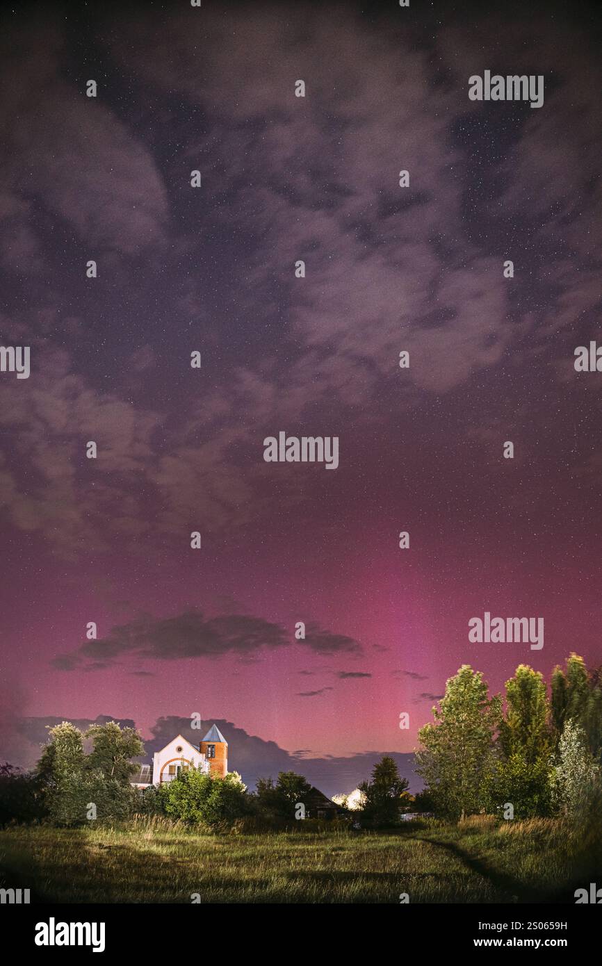 Aurora borealis Amazing Night Starry Sky above summer country landscape ...