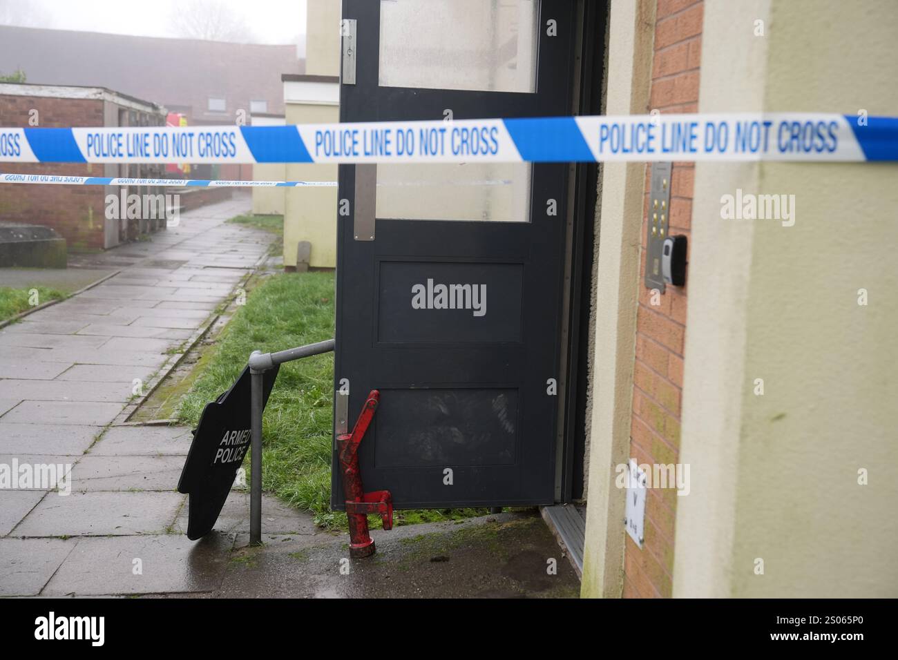 A police shield and battering ram at the scene on Fownhope Close in ...