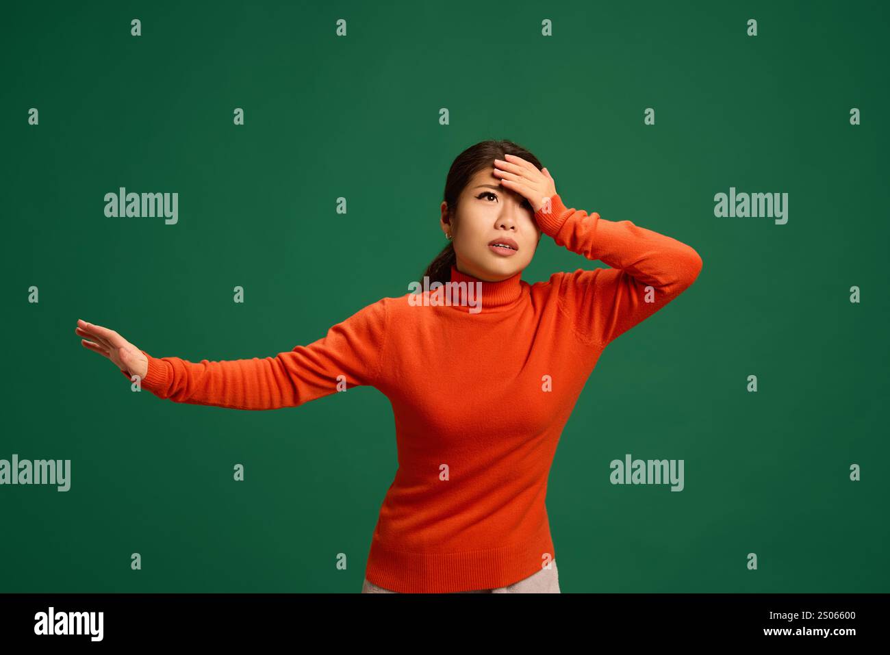 Woman touching forehead, showing dizziness or fatigue, common symptoms ...