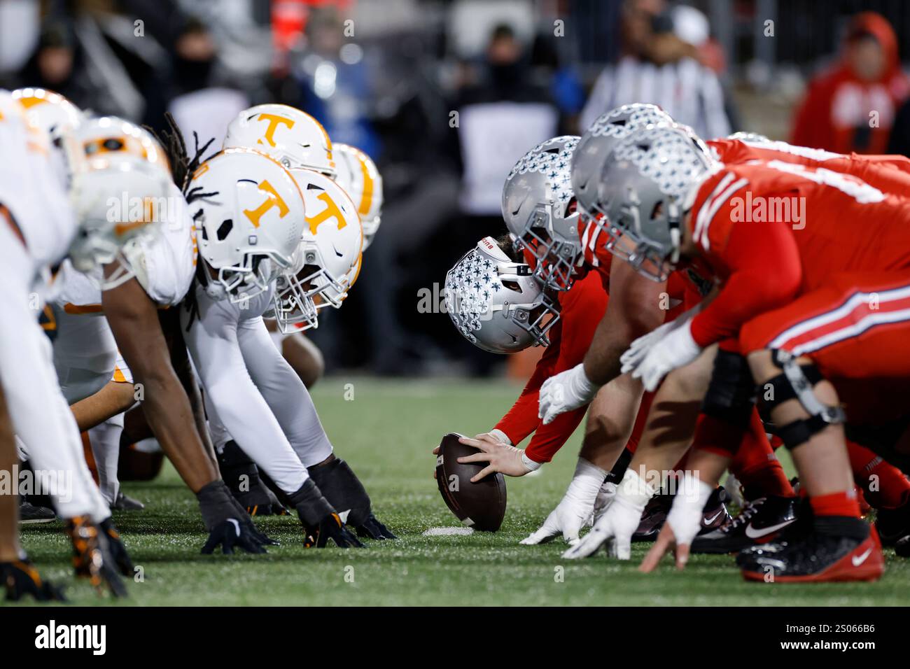 COLUMBUS, OH - DECEMBER 21: Ohio State Buckeyes and Tennessee Volunteers face off at the line of ...