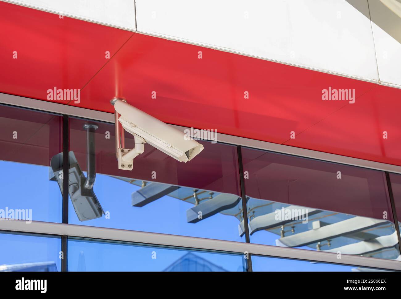 Outdoor surveillance camera on the facade of an office building ...