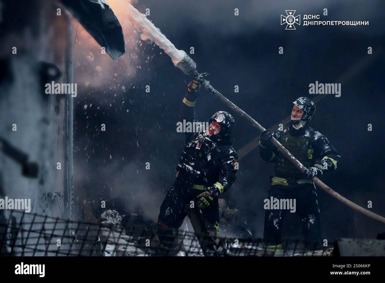 In this image provided by the Ukrainian Emergency Service, firefighters ...