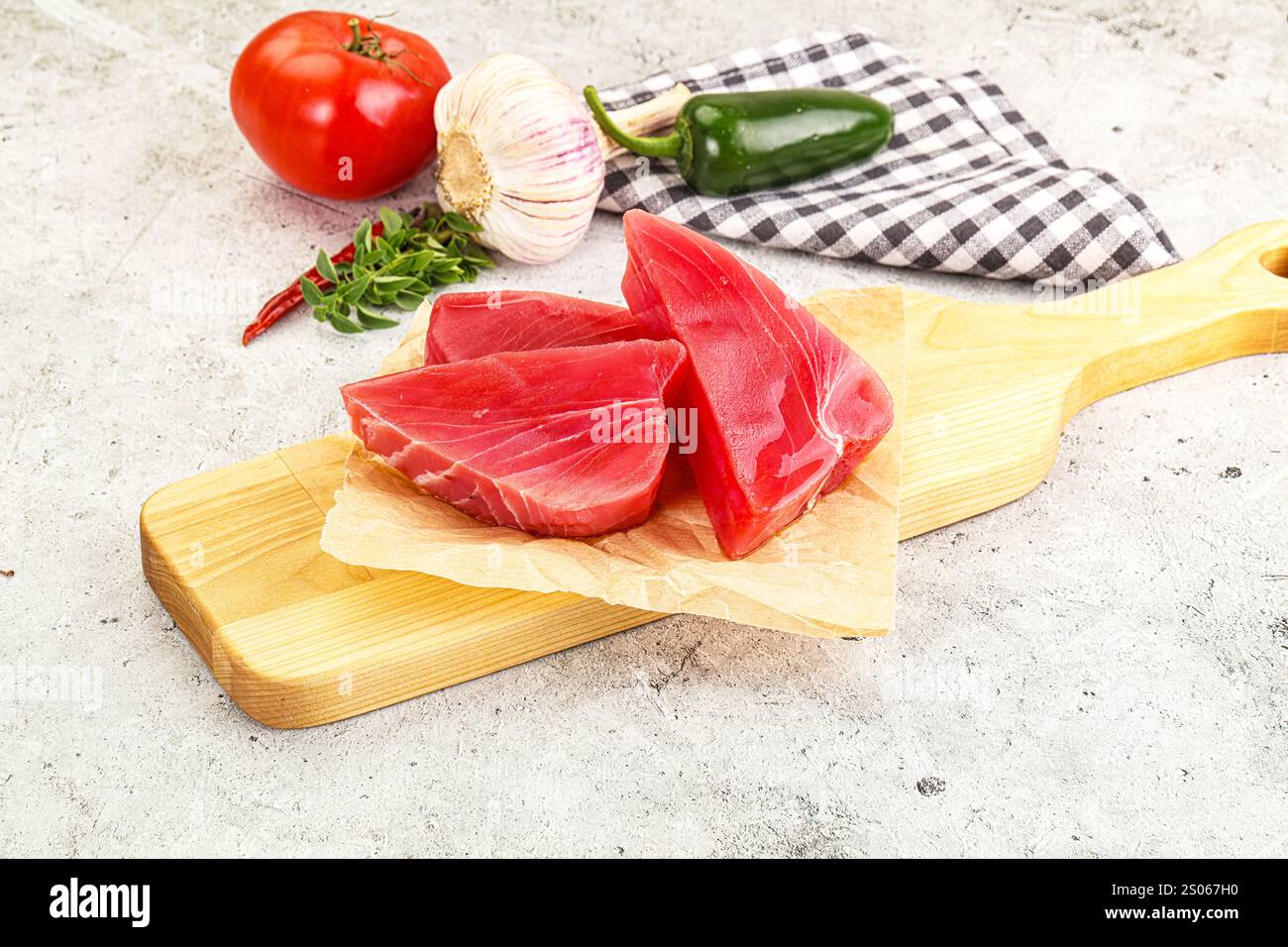 Raw fresh tuna fish steak fillet Stock Photo - Alamy