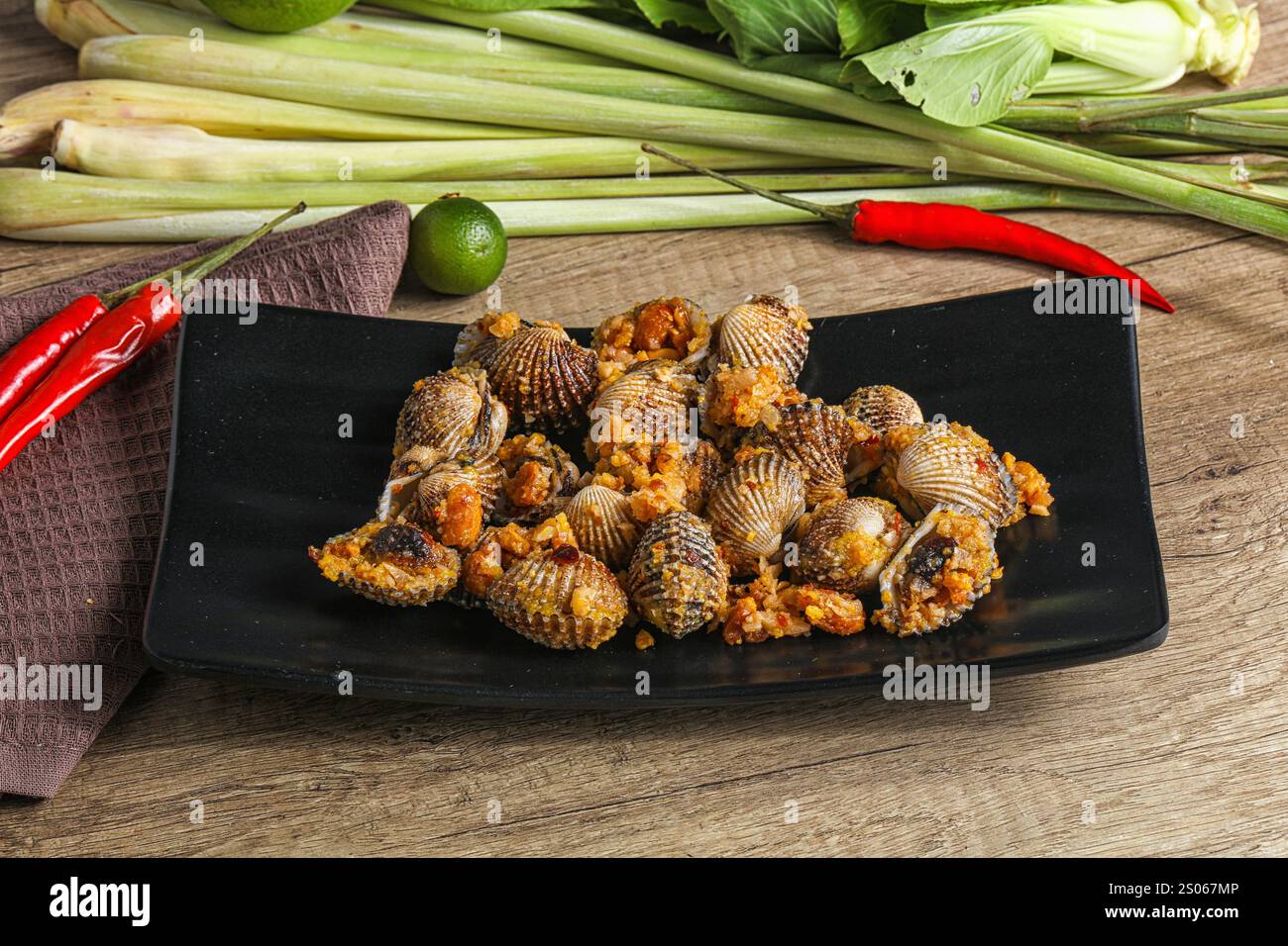 Blood Cockle Fried With Garlic and spices Stock Photo - Alamy