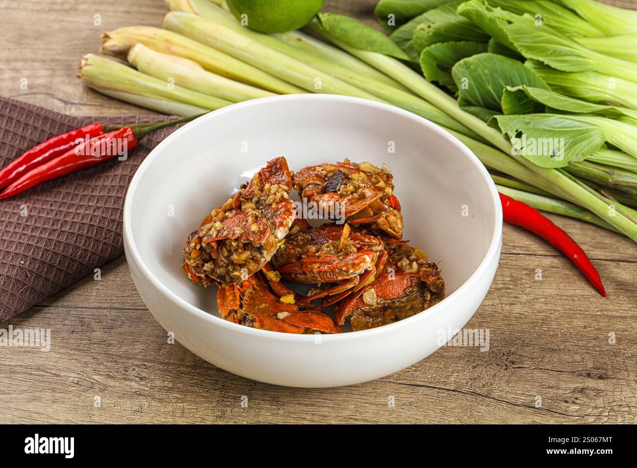 Tasty Steamed Spider crab Claws in tamatind sauce Stock Photo - Alamy