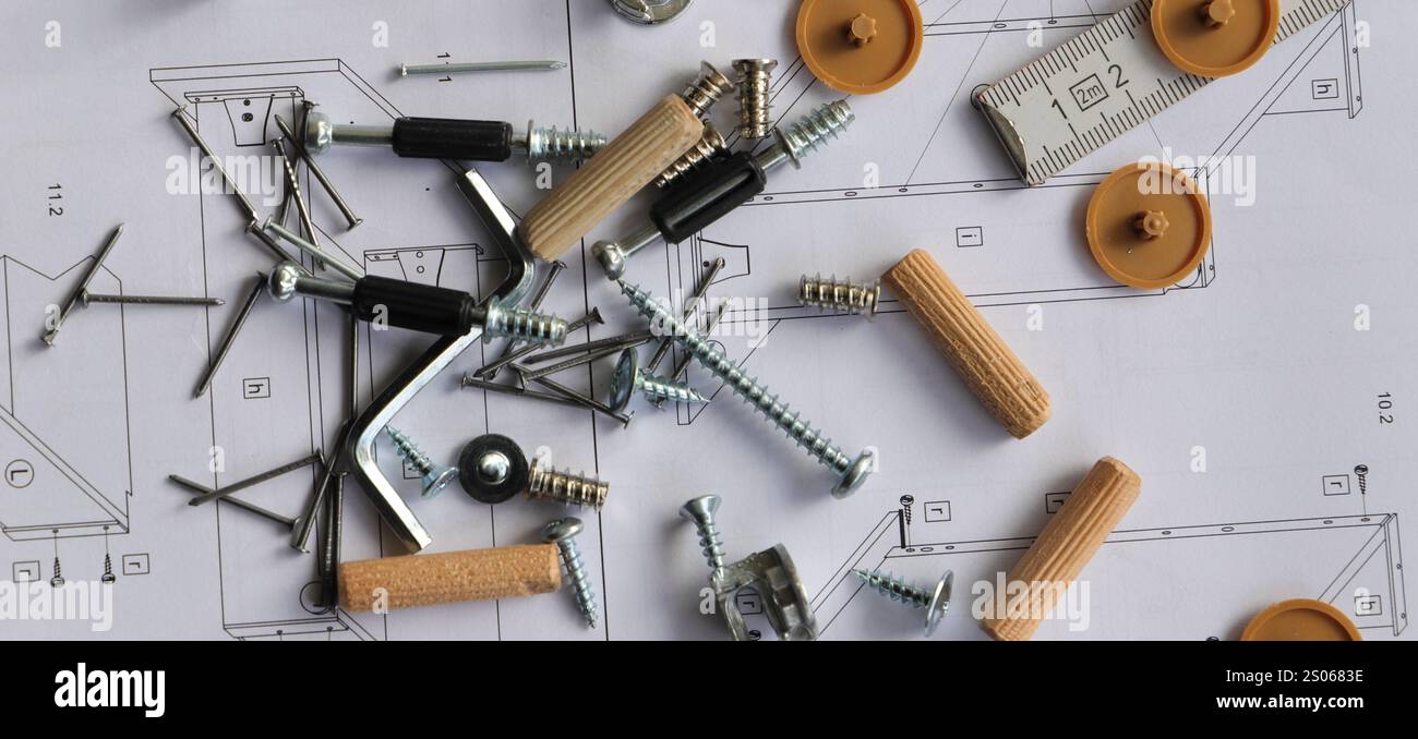 an assembly manual for furniture with screws and dowels Stock Photo - Alamy