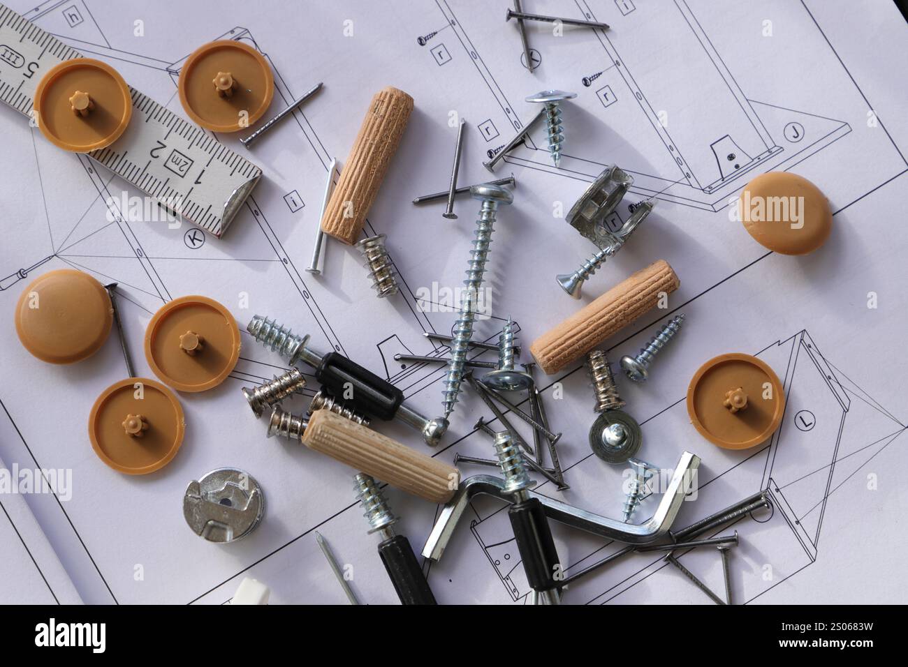 an assembly manual for furniture with screws and dowels Stock Photo - Alamy