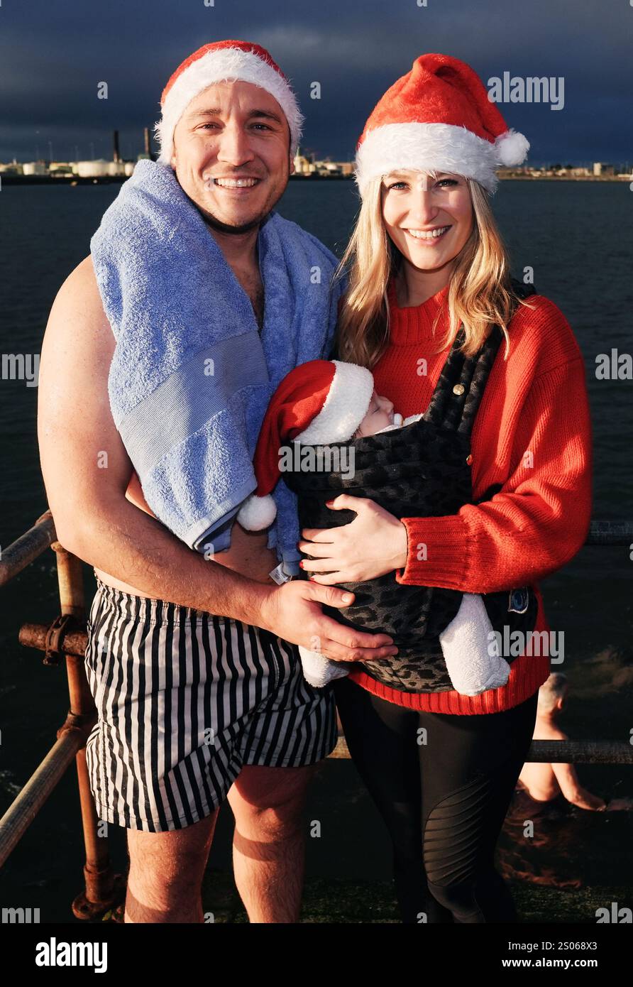 Sean Mulligan (left) and Jill Owens with their ten-week-old daughter ...
