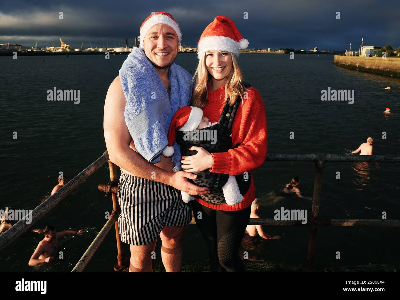 Sean Mulligan (left) and Jill Owens with their ten-week-old daughter ...
