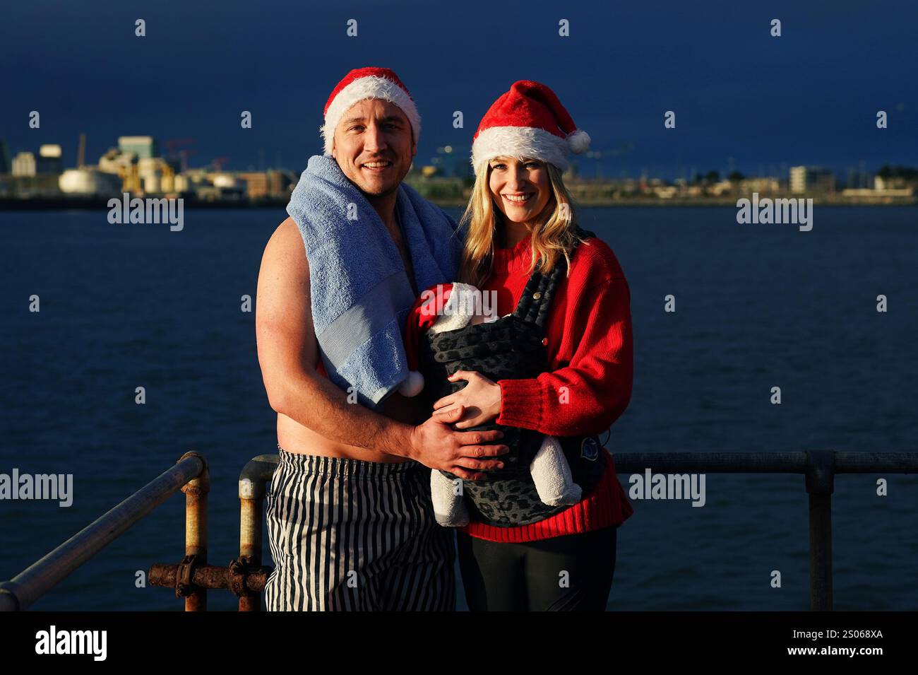 Sean Mulligan (left) and Jill Owens with their ten-week-old daughter ...