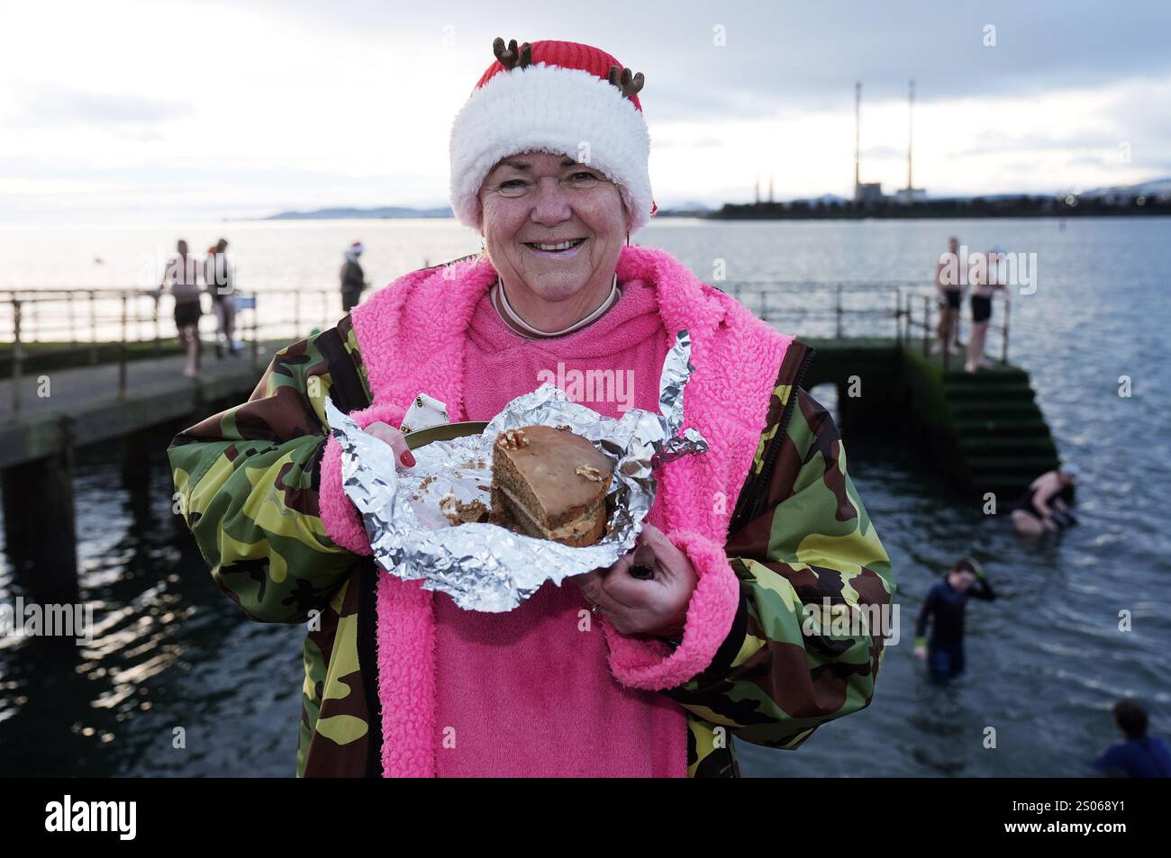 Lucy Winkelmann, from Clontarf, shares cake after taking part in the ...