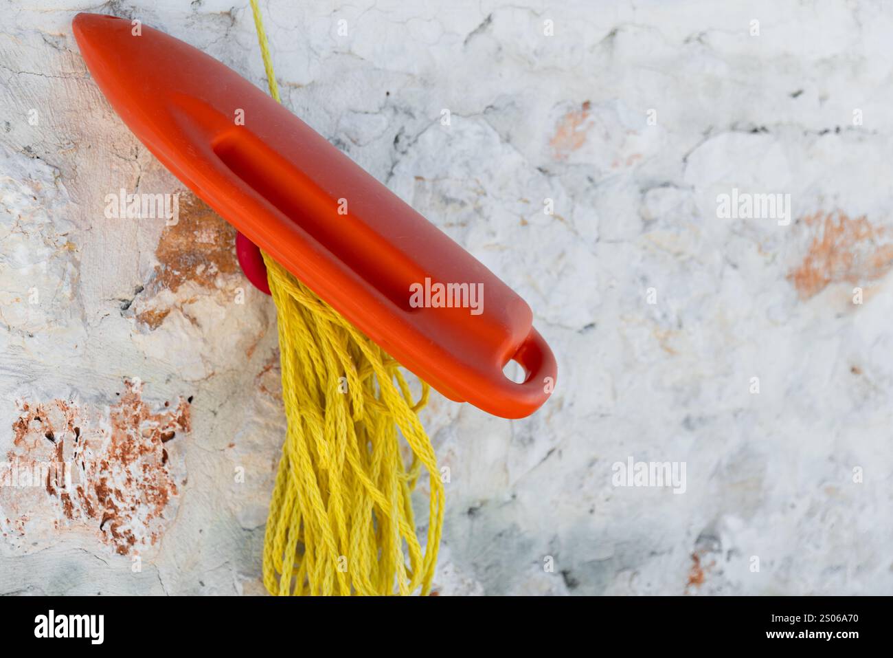 Swimming area safety equipment, red lifeguard rescue can with yellow ...