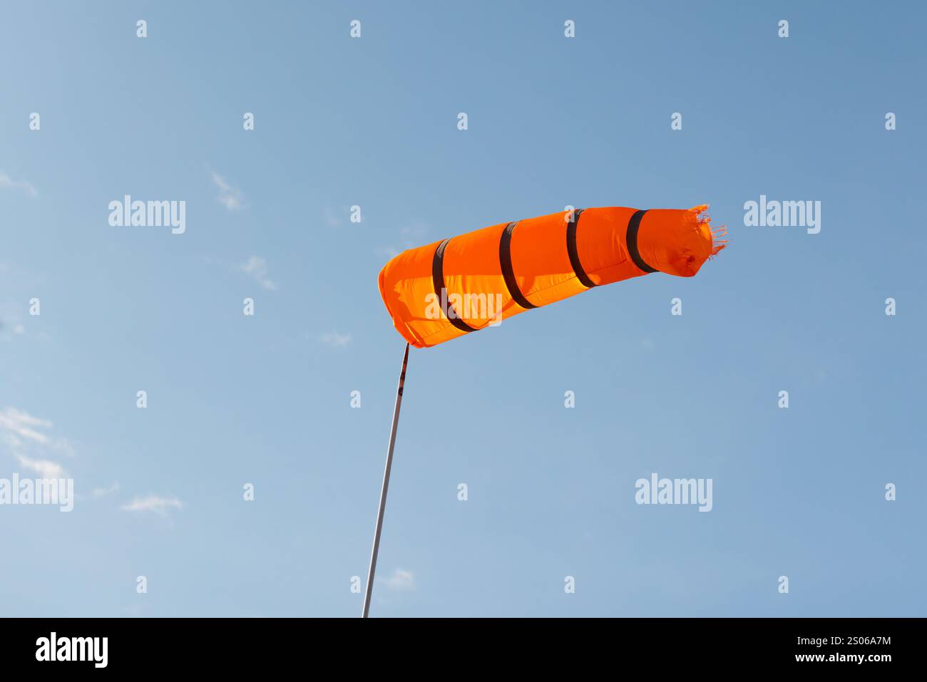 Windsock under blue sky hi-res stock photography and images - Alamy