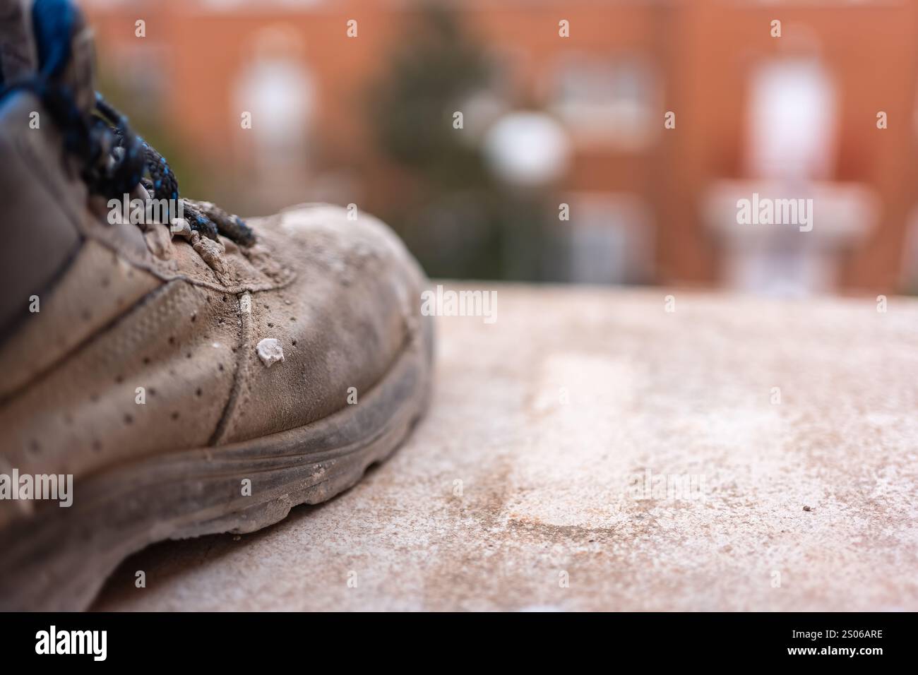 Mason's boot with accident protection placed on a shelf on the ...