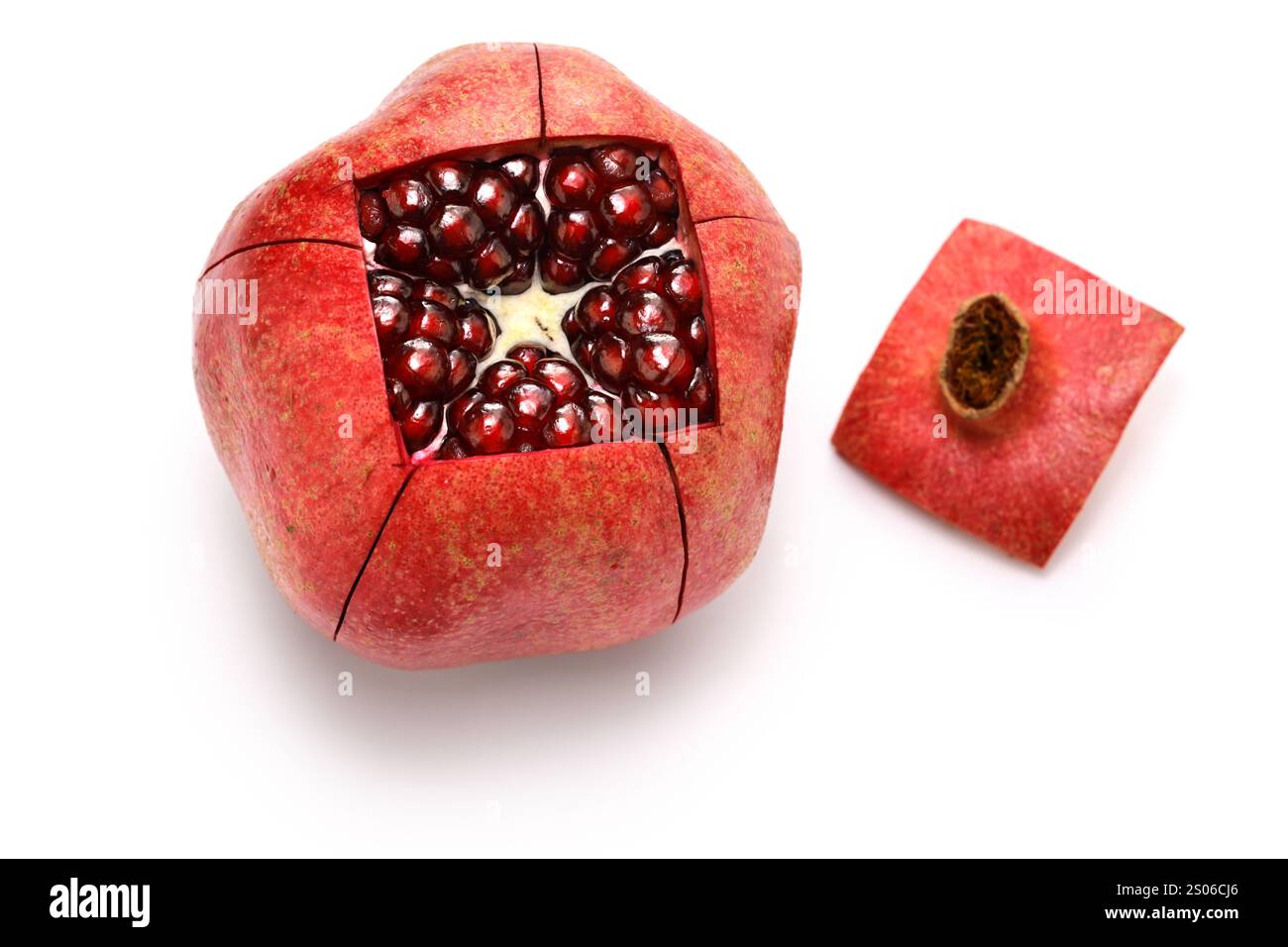 How to peel a pomegranate Stock Photo - Alamy