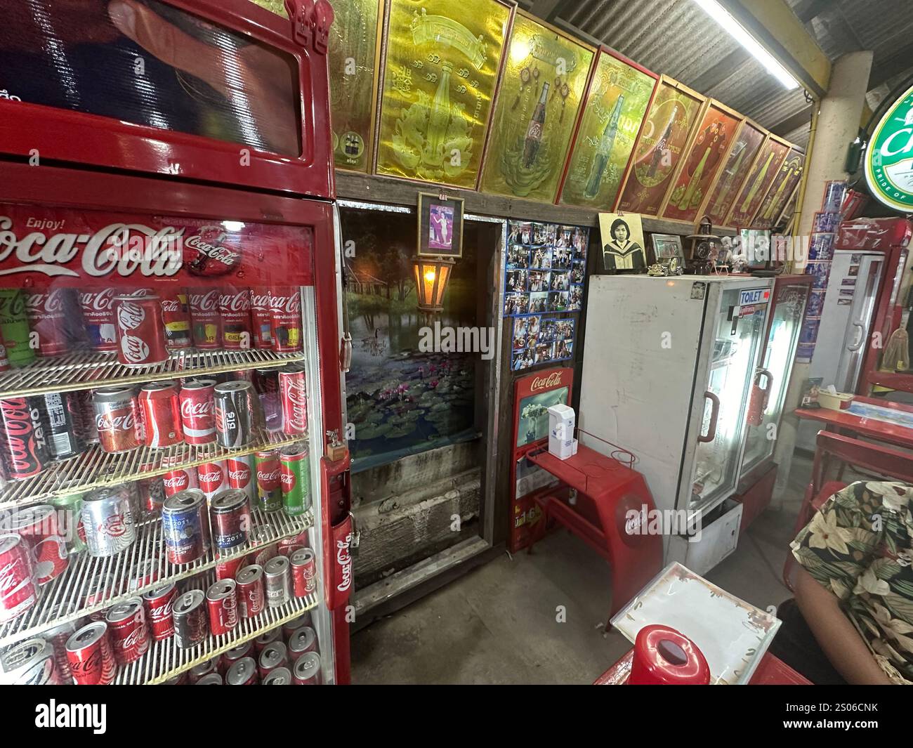 A wellknown coca cola refrigerator is prominently placed in the middle ...
