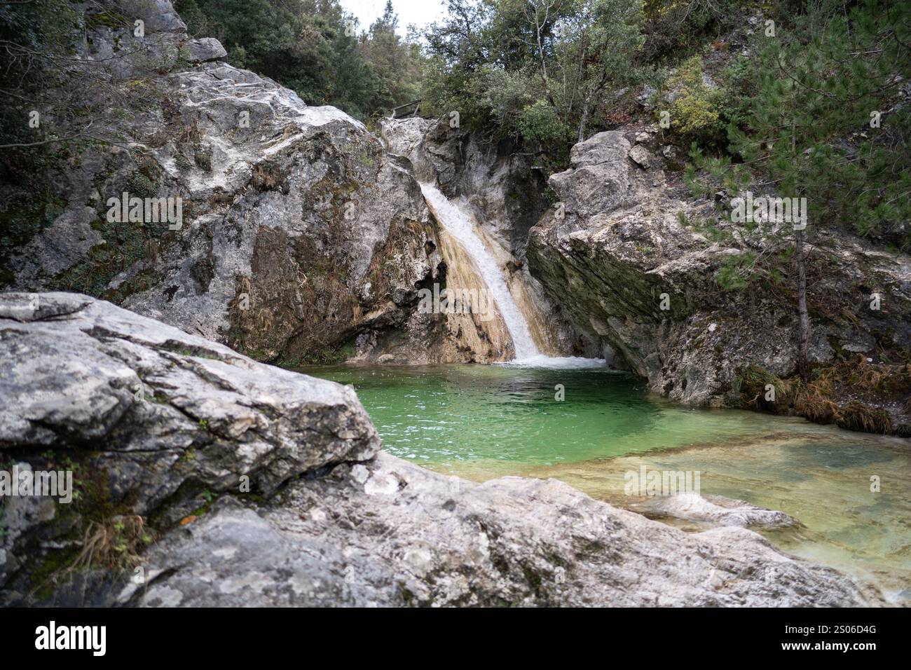 A serene and picturesque view of the waterfalls in Agia Kori, located ...