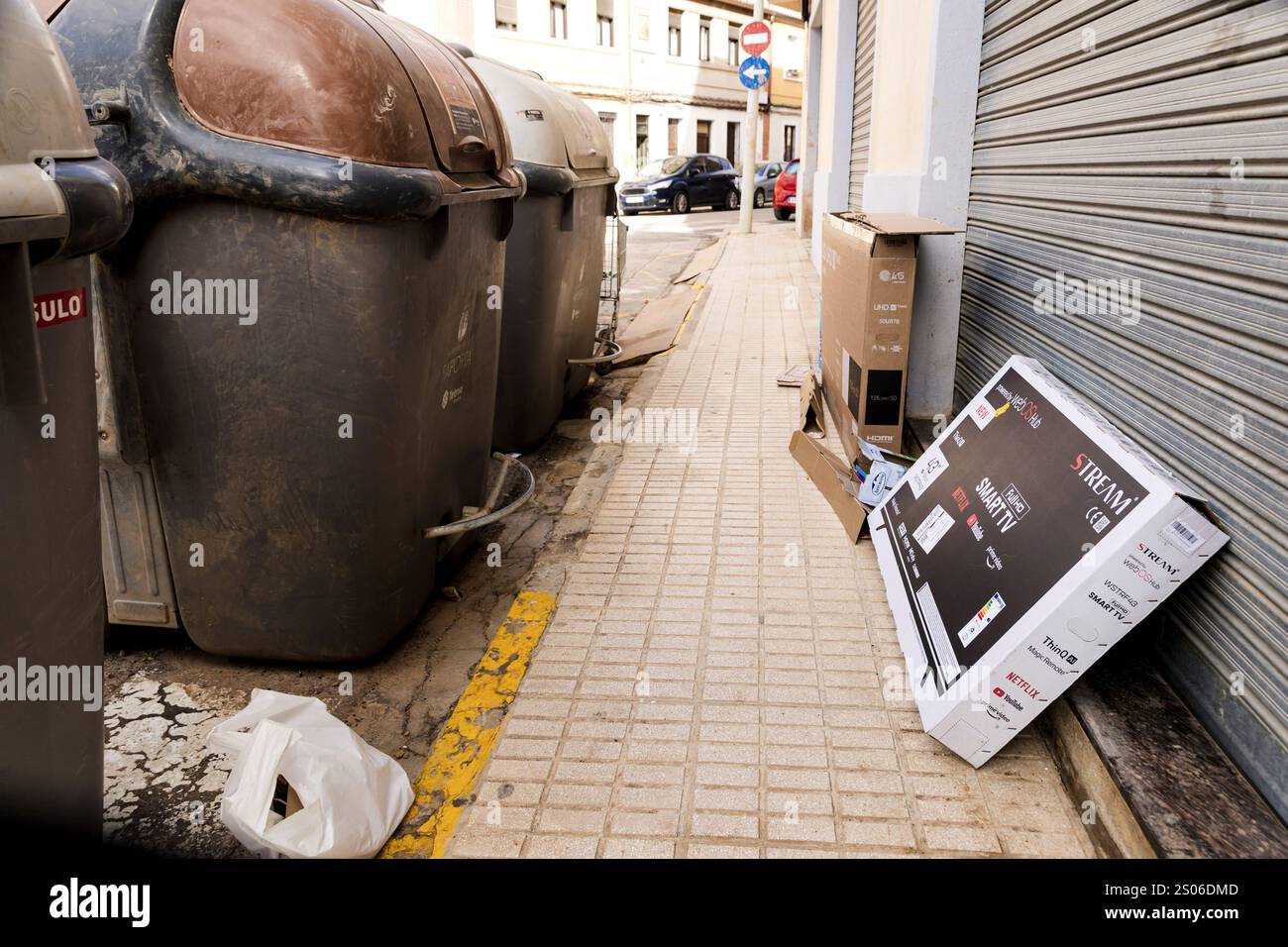 Trash garbage cans full of gift wrapping paper, on December 25, 2023 ...