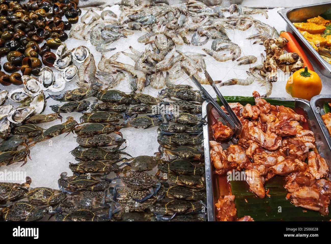 The street market offers a wide range of fresh seafood and pickled meat ...