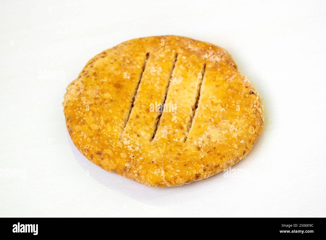Crispy Bakarkhani, isolated on a white background. Baqarkhani is a ...