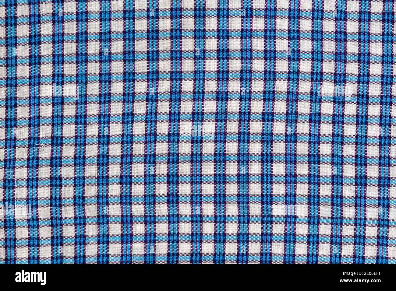 Checkered blue and white textile fabric background Stock Photo - Alamy