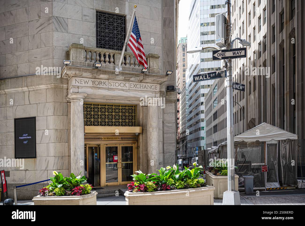 New York Stock Exchange building with American flags Stock Photo - Alamy