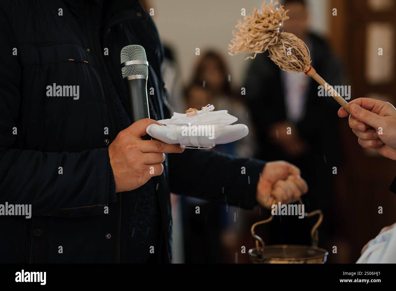 Solemn moment of baptism hi-res stock photography and images - Alamy