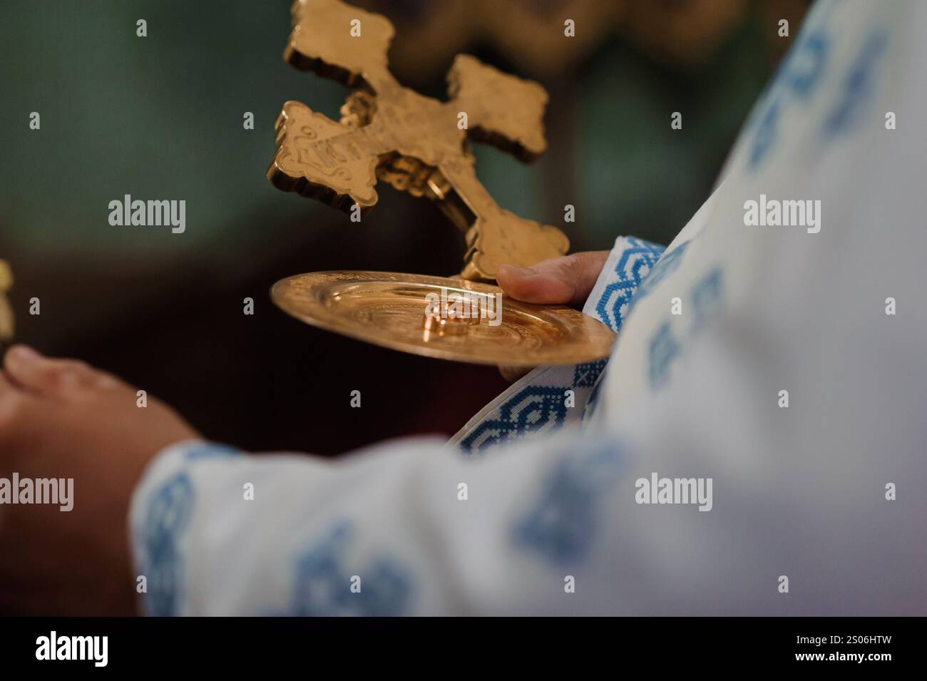 Golden Cross and Plate in Religious Ceremony Stock Photo - Alamy