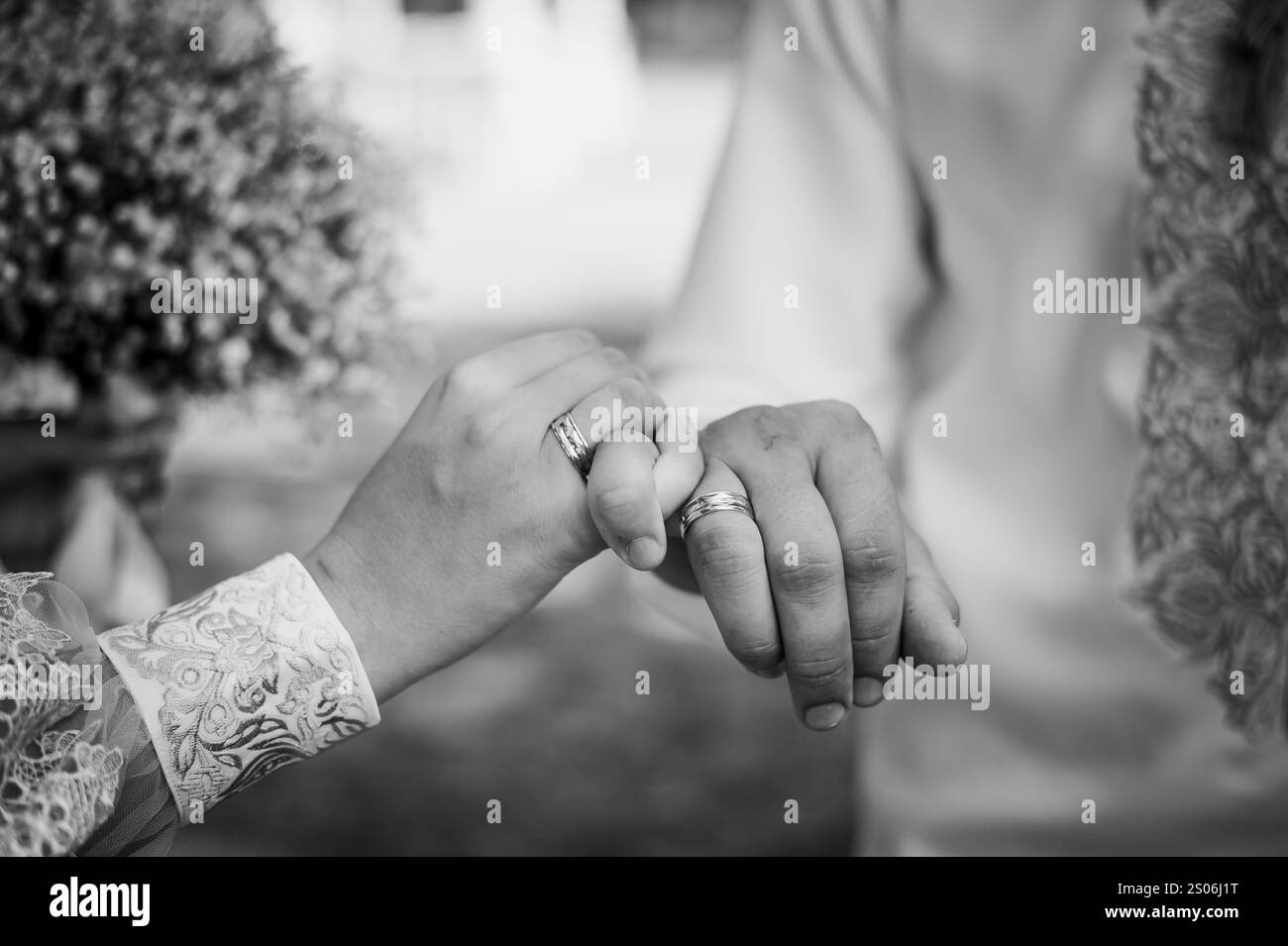A Moment of Connection: Hands Engaged in a Beautiful Wedding Ceremony ...