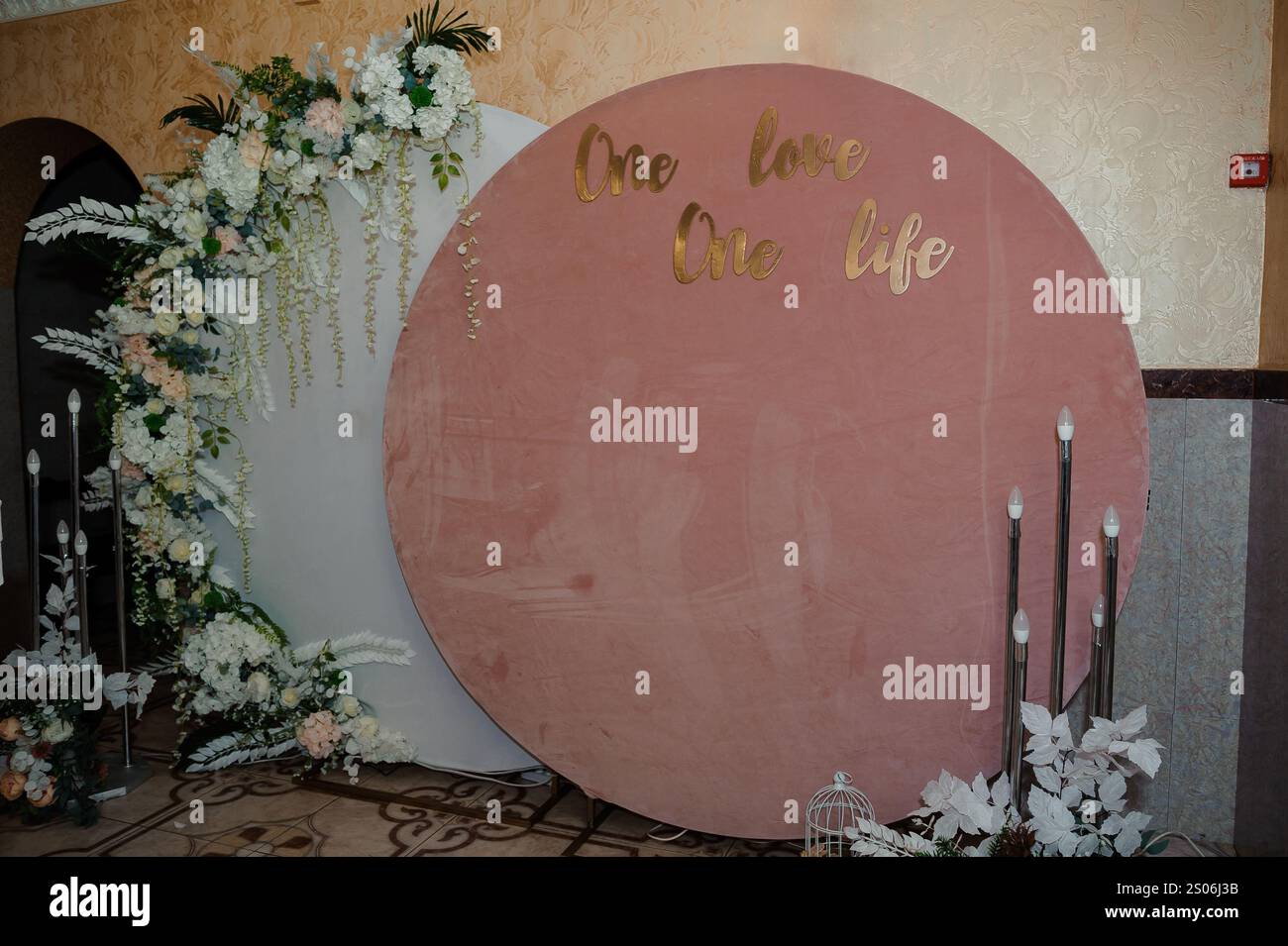 Elegant Wedding Backdrop with Floral Arrangements and Inspirational ...