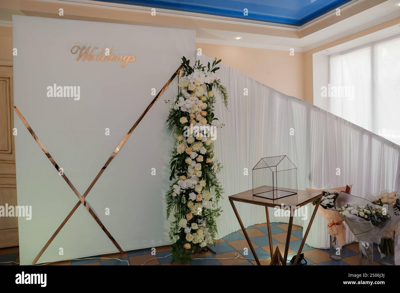 Elegant Wedding Reception Setup with Floral Decor Stock Photo - Alamy