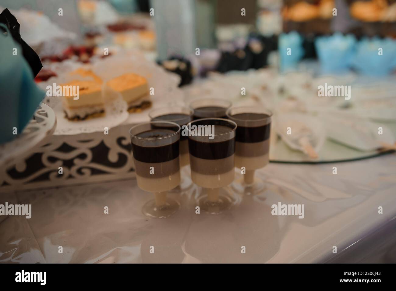 Elegant Dessert Table Display with Chocolate Layered Desserts Stock Photo - Alamy