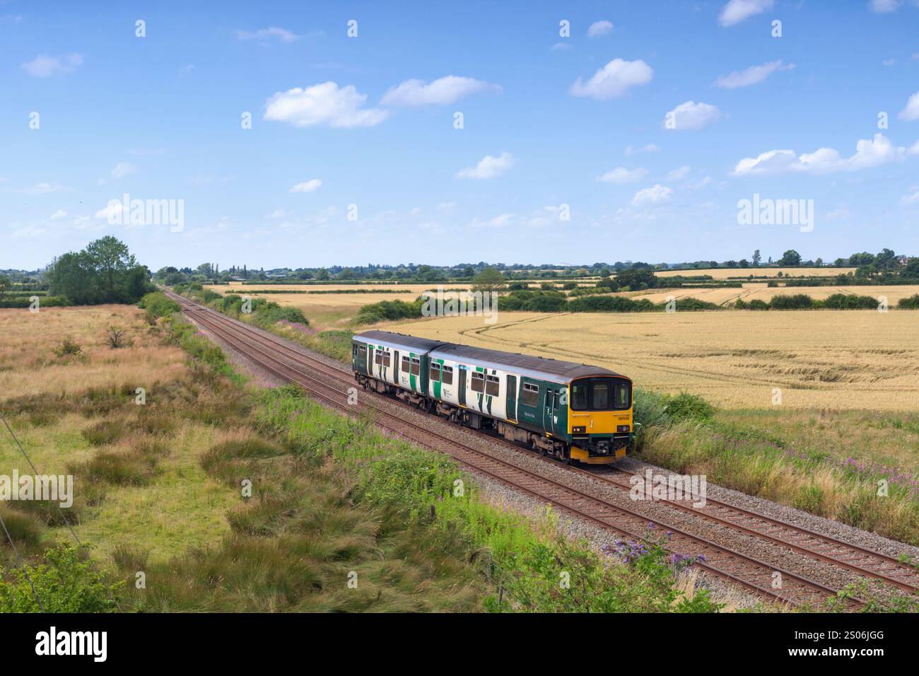 West Midlands Railway class 150 sprinter train 150139 passing Church ...