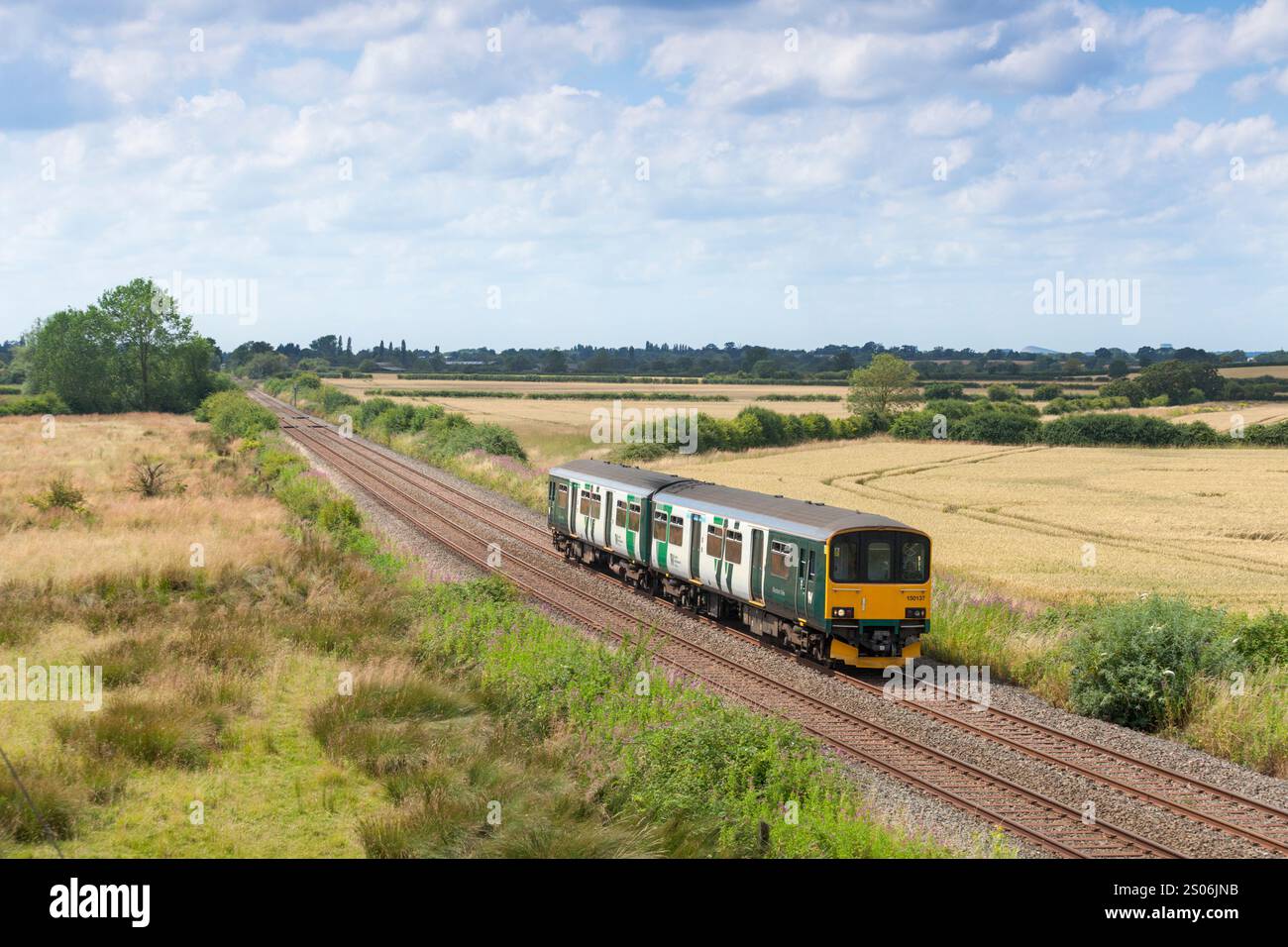 West Midlands Railway class 150 sprinter train 150139 passing Church ...