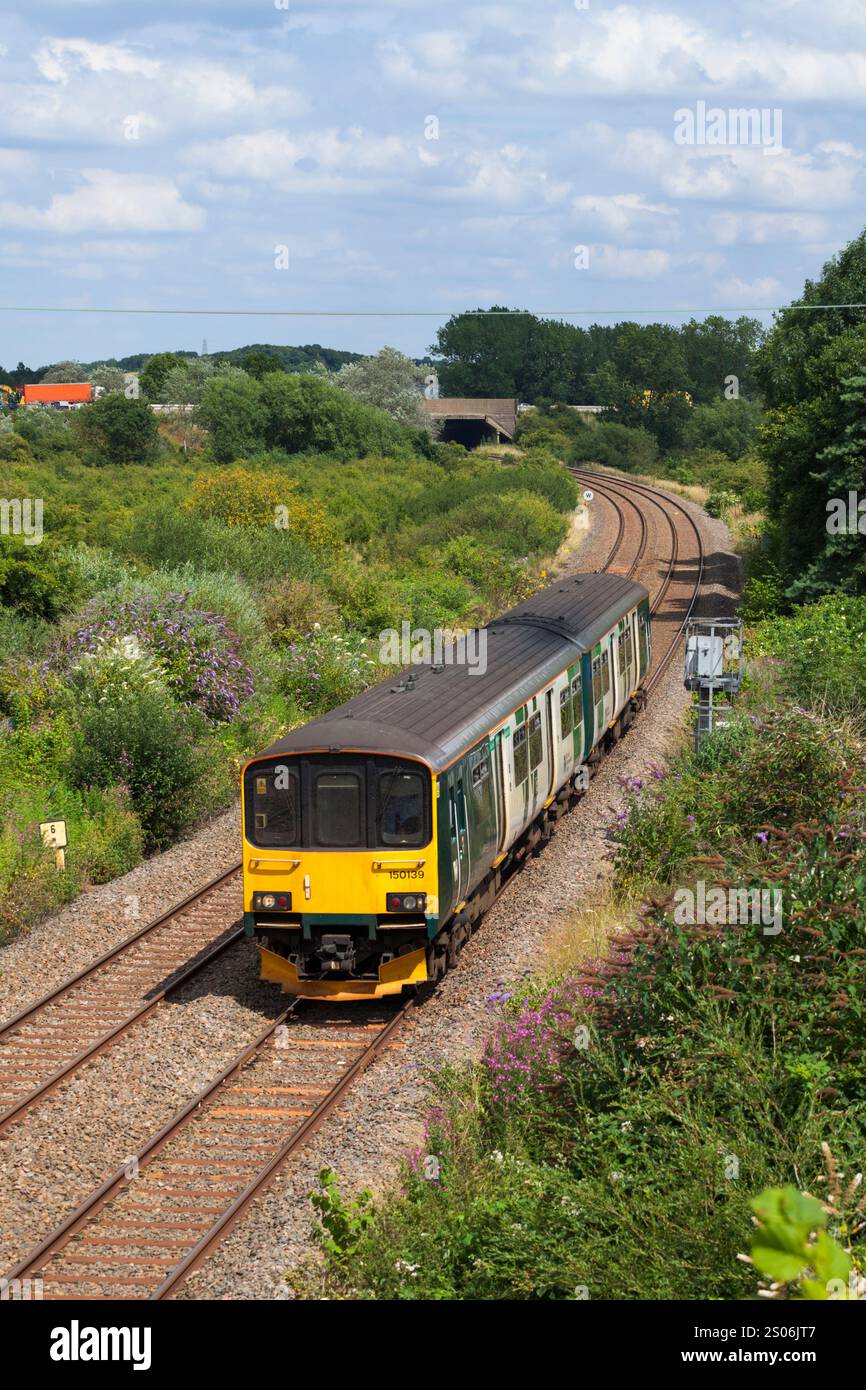 West Midlands Railway class 150 sprinter train 150139 passing Church ...