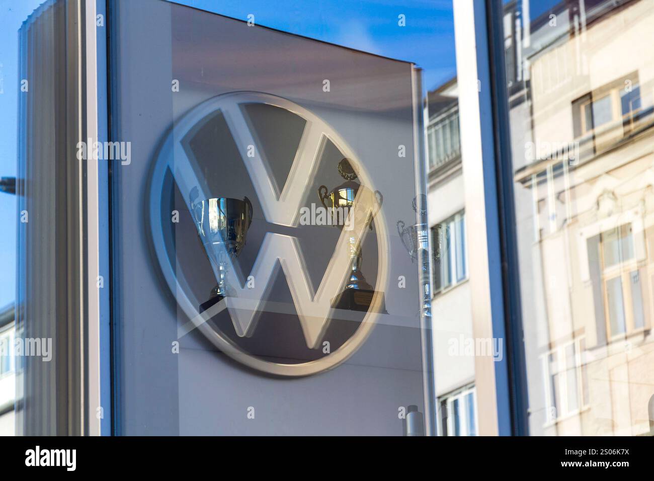New Volkswagen company logo on dealership building on November 28, 2024 ...