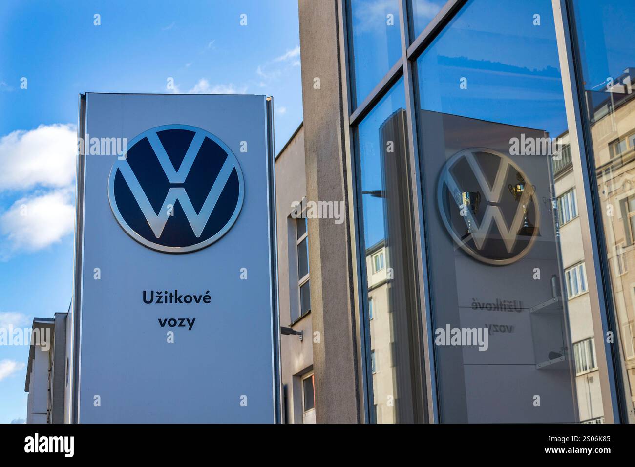 New Volkswagen company logo on dealership building on November 28, 2024 ...