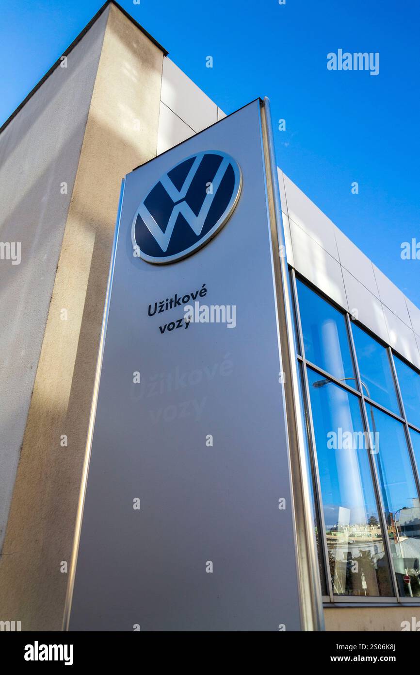 New Volkswagen company logo on dealership building on November 28, 2024 ...