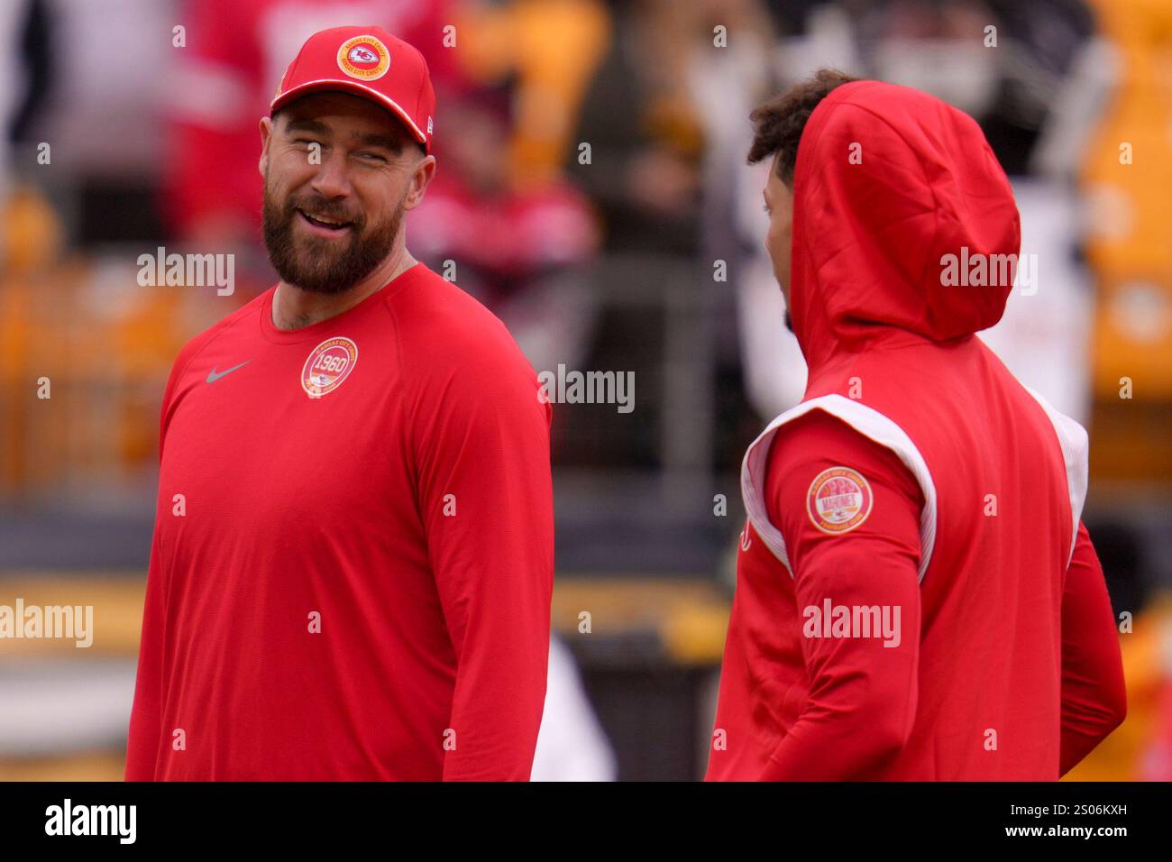 Kansas City Chiefs tight end Travis Kelce speaks with quarterback ...