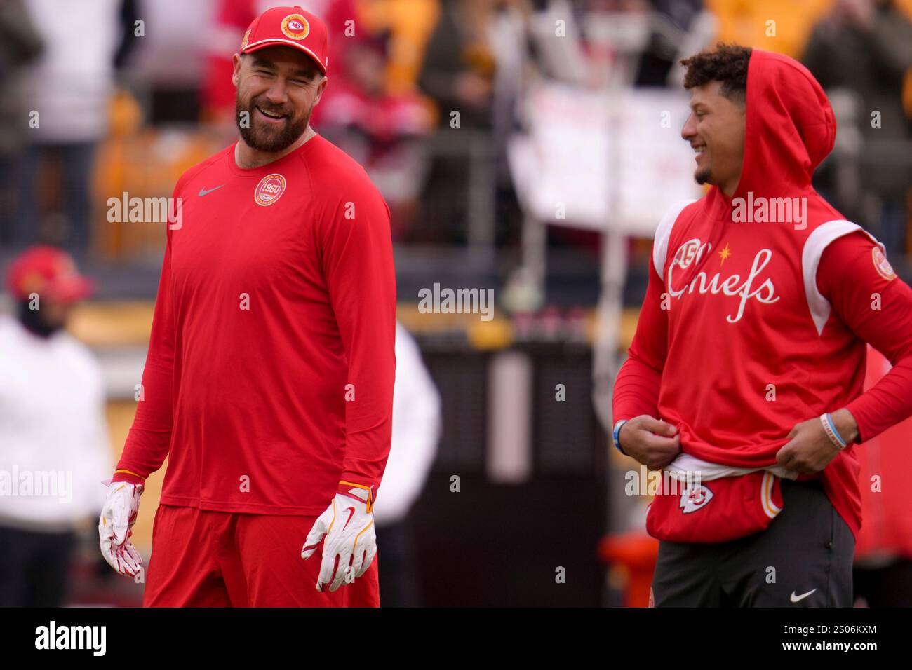 Kansas City Chiefs tight end Travis Kelce speaks with quarterback ...