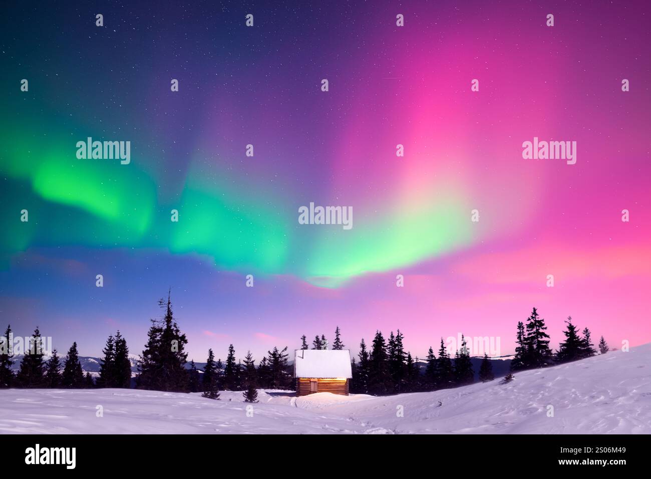 Cozy wooden cabin in snowy mountains under incredible Northern lights ...
