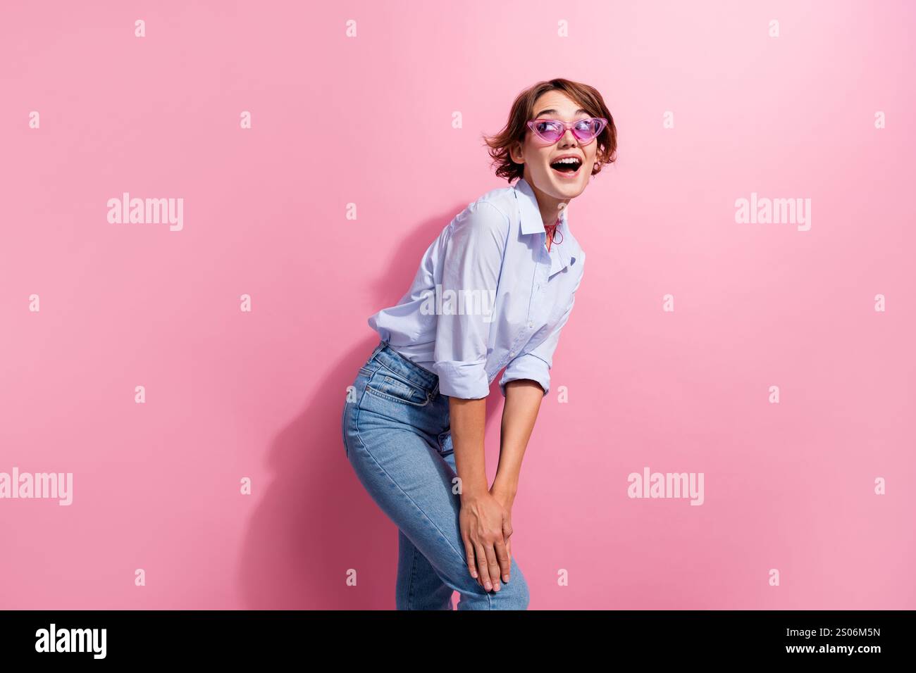 Photo of astonished cheerful lovely girl look empty space ad blank ...