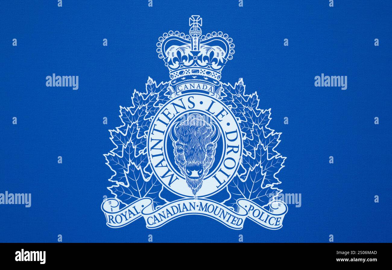 The RCMP logo is seen on the background for a news conference, in St ...