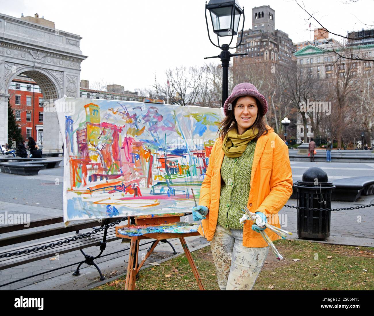 Posed portrait of a painter working in Washington Square Park in ...