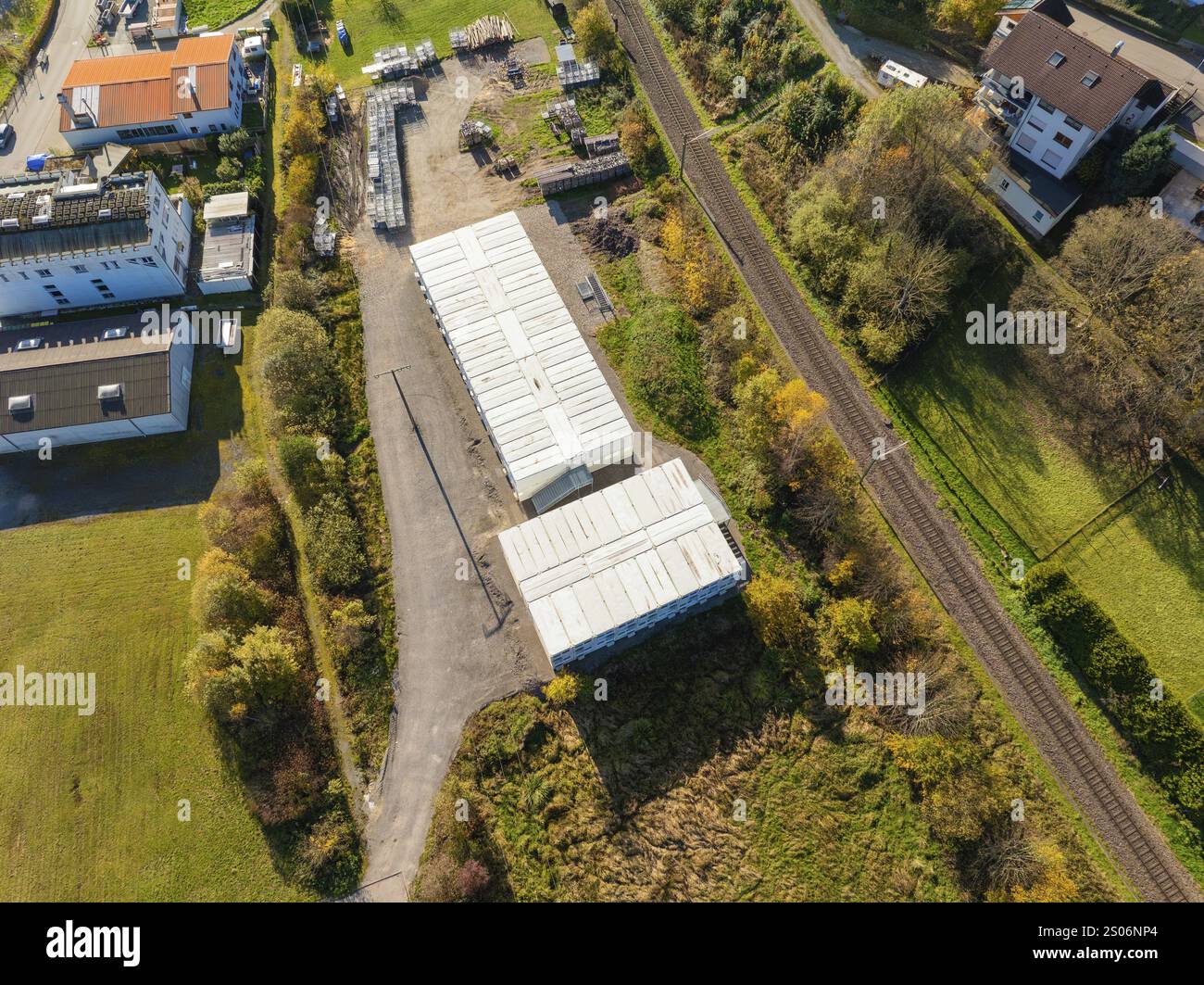 Industrial facilities in a rural area near railway lines, refugee ...