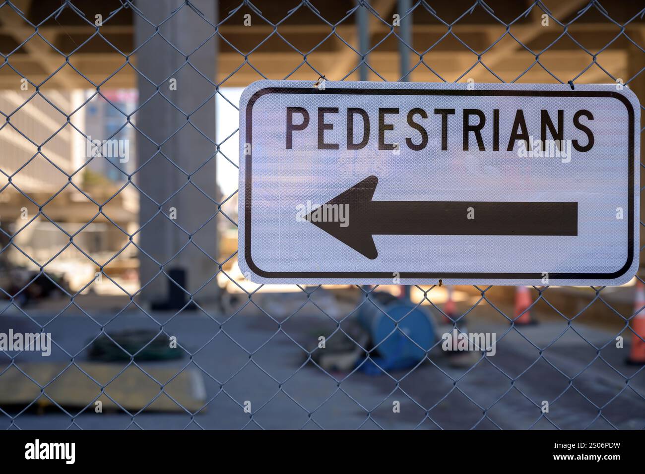 Pedestrian diversion road warning sign with left facing arrow, black ...